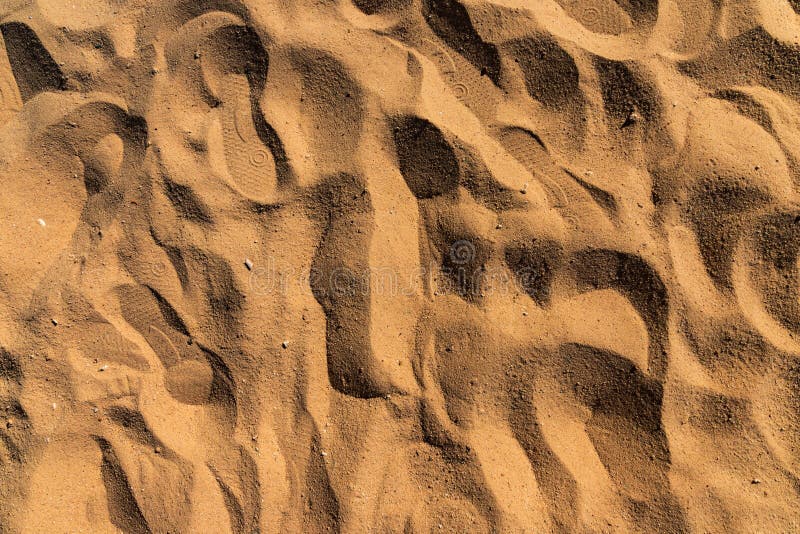 Human Footprints on the Sand on the Beach. Background Stock Photo ...