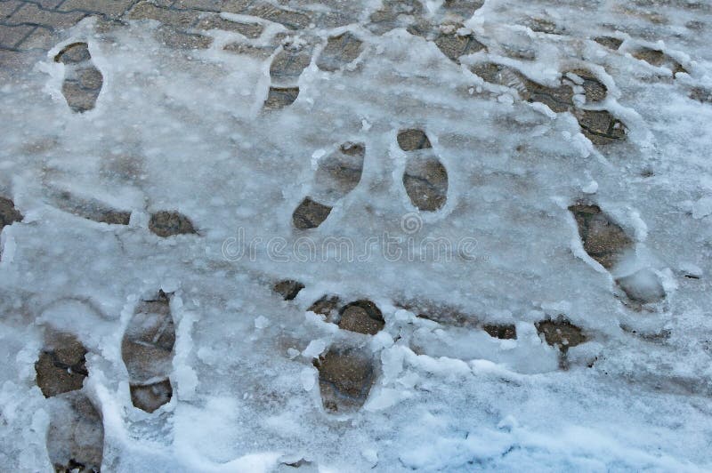 Human Footprints in Wet Snow Stock Image - Image of cobblestone ...