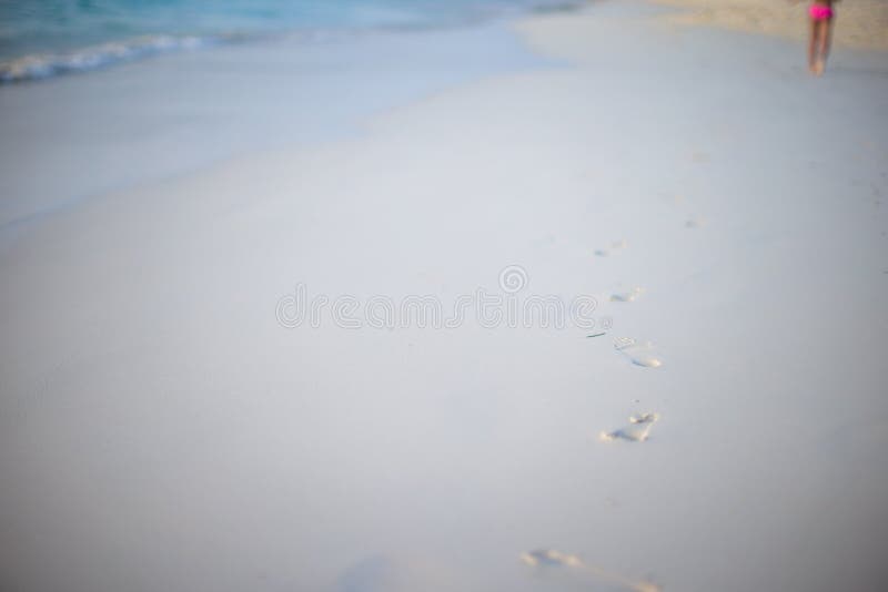 Human Footprints on White Sand Beach Stock Image - Image of sand ...
