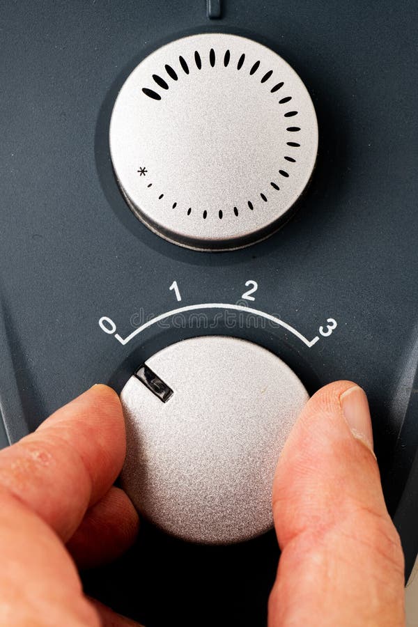 Human Hand-adjusting Heating Regulator To Save Energy. the Concept of ...