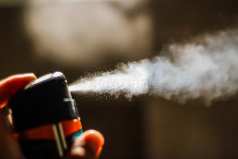 Hand with an atomizer stock photo. Image of prevention - 9092662