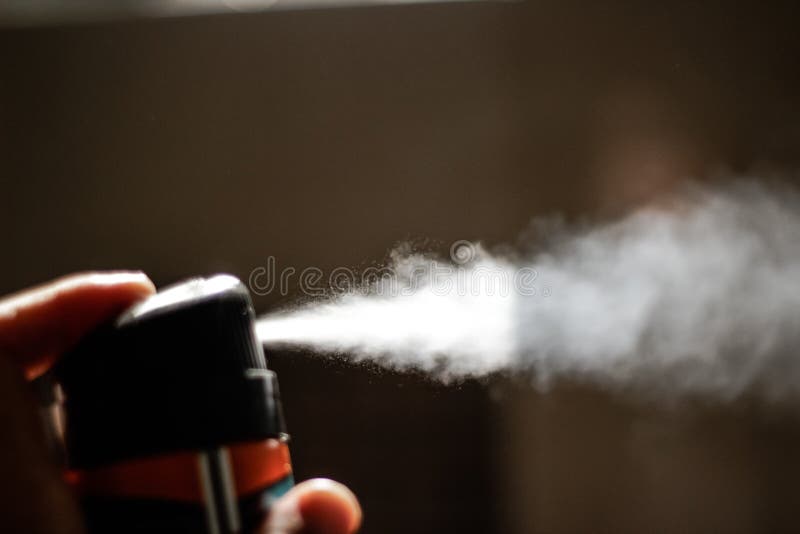 Hand with an atomizer stock photo. Image of prevention - 9092662