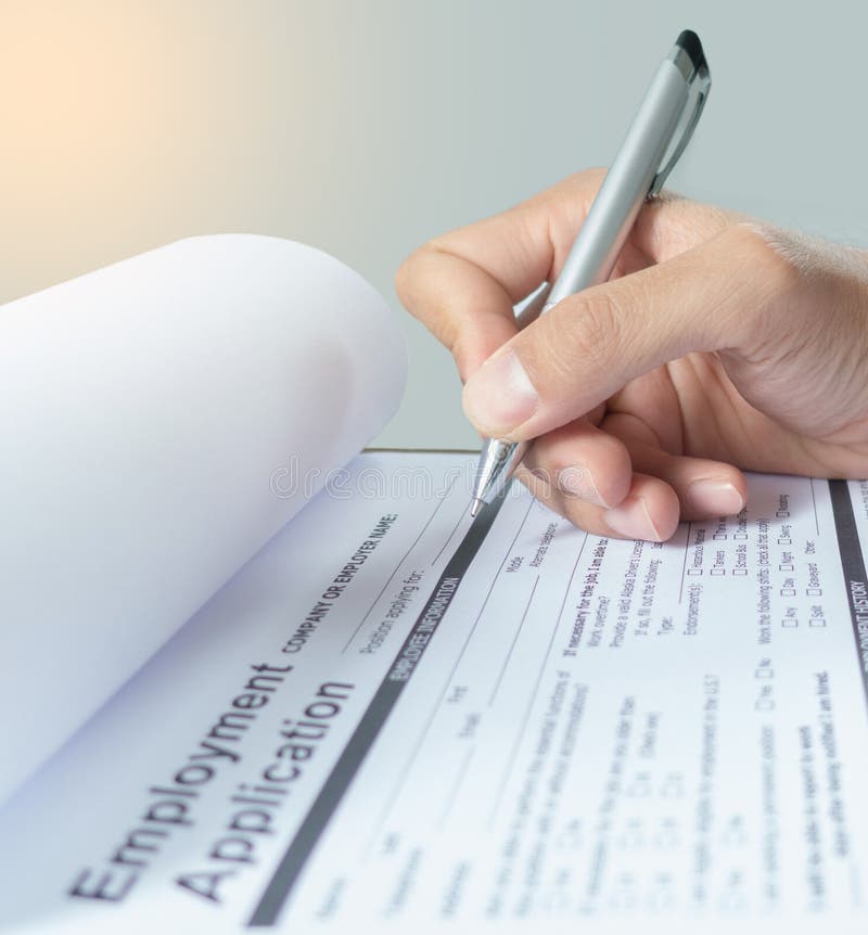 Human Hand with Ballpoint Pen Over Application Form Stock Photo - Image ...