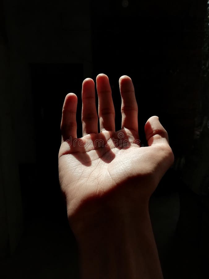 Human Hand on Black Background, Hand in the Darkness Stock Photo ...