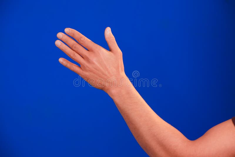 Human Hand on Blue Background Chroma-key. Stock Photo - Image of ...