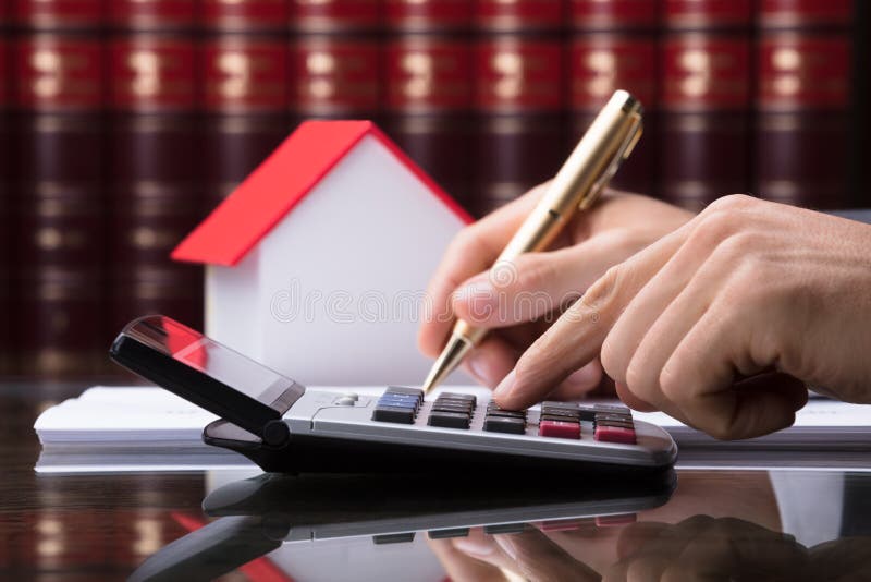 Human Hand Calculating Tax stock photo. Image of counting - 124750798