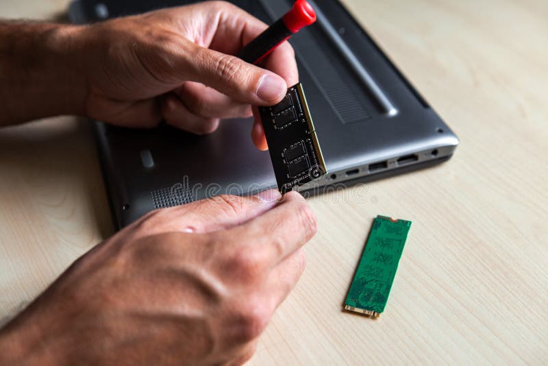 A Human Hand with a Computer Memory Frame. he Wants To Install it in ...