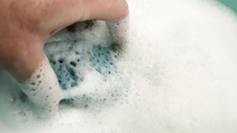 Human Hand Creating Foam with Sponge. Preparation of Foamy, Soapy ...