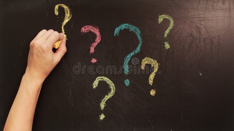 Human Hand Draws Lot of Question Marks with Chalk on Blackboard. Many ...