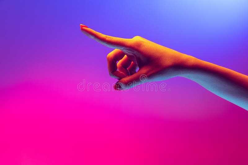 Human Hand Gesturing on Gradient Purple-pink Background in Neon Light ...