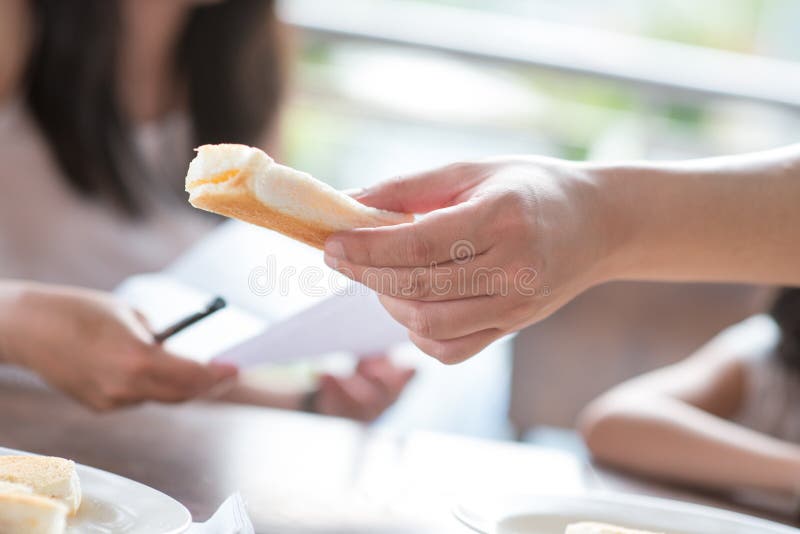 Human hand holding bread stock image. Image of morning - 124771019