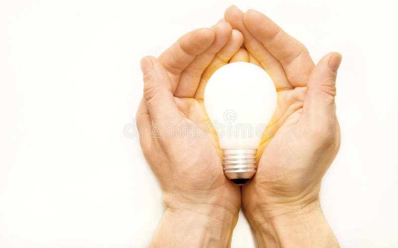 Human hand holding a lamp stock photo. Image of creative - 50544652