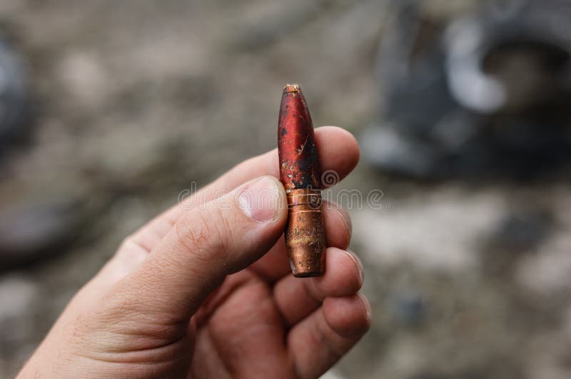 Human Hand Holding a Large-caliber 12.7mm Armor-piercing Incendiary ...