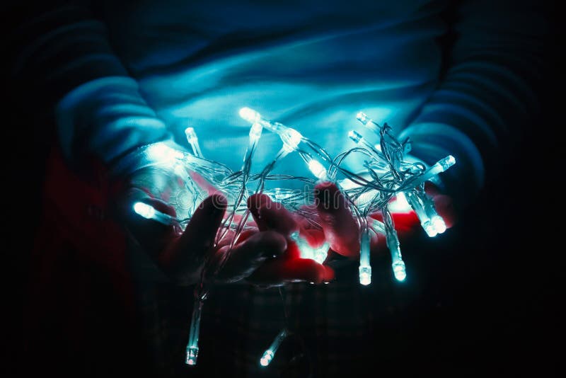 Human Hand Holding Led Serial Rice Lights. Stock Photo - Image of ...