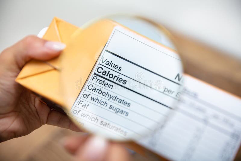 Human Hand Holding Magnifying Glass Over Package Stock Photo - Image of ... Human Hand Holding Magnifying Glass Over Package Stock Photo - Image of ...