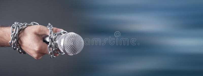 Human Hand Holding Microphone Tied with Chains Stock Photo - Image of ...