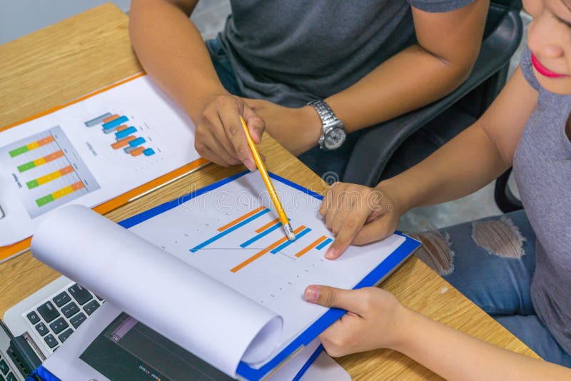 Human Hand Holding Pencil Pointing at Chart Data Stock Photo - Image of ...