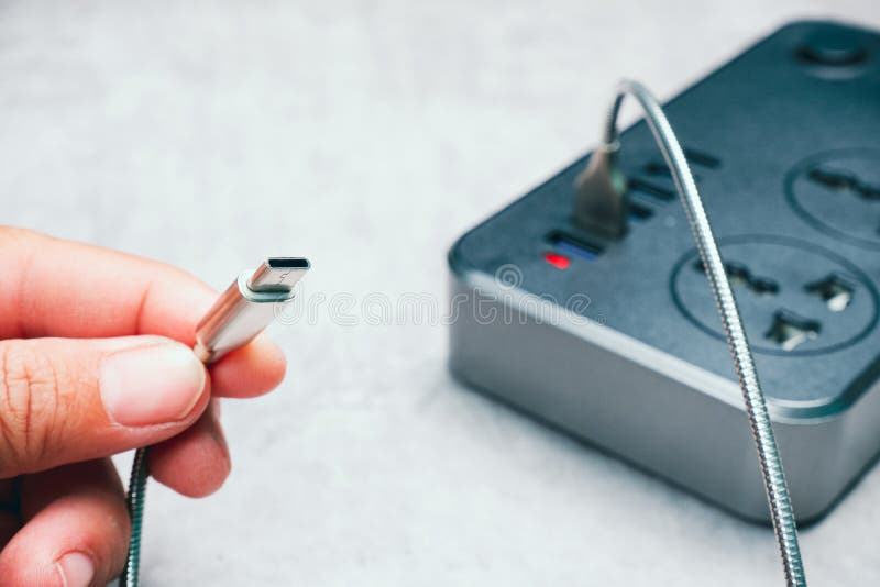 Human Hand Holding a Type C Mobile Phone Charger Cable Stock Photo ...