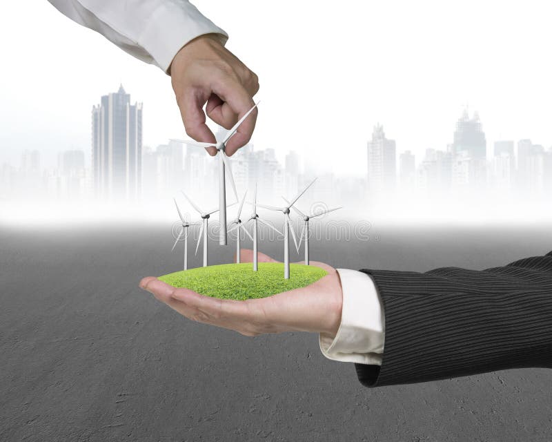 Human Hand Holding Windmills on Grass Stock Photo - Image of ecology ...