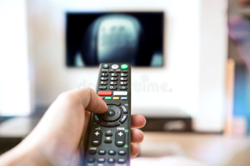 Human Hand Holds a Remote Control Stock Image - Image of background ...