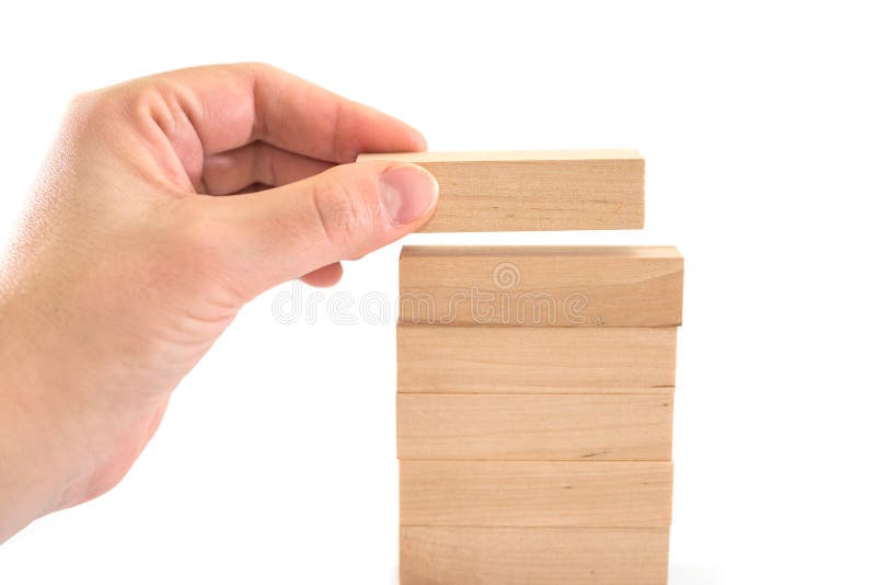 The Human Hand Lays Down Wooden Blocks Stock Photo - Image of coach ...