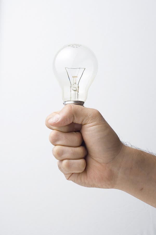 A Human Hand and a Light Bulb Stock Image - Image of solution, hand ...