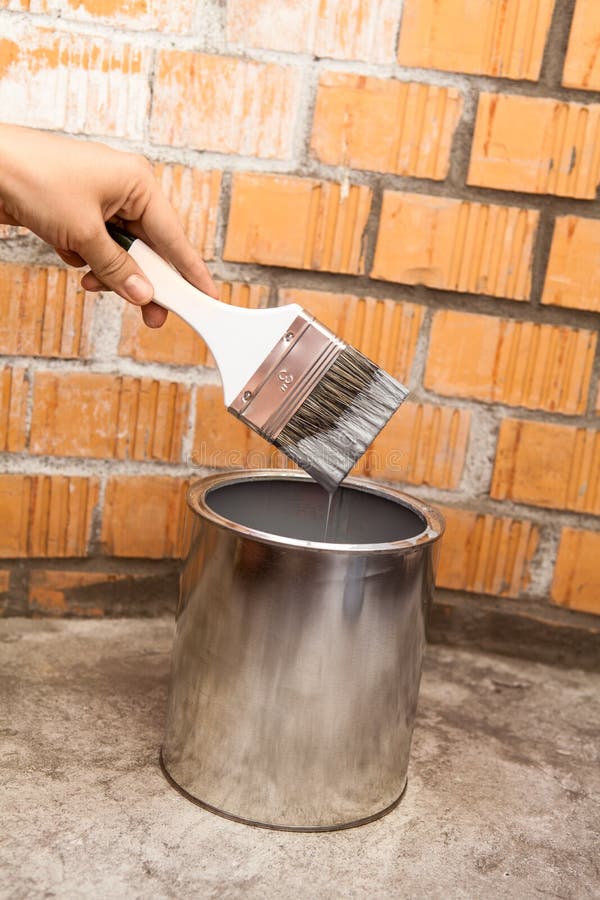 Human Hand with Paint Brush in Grey Color Stock Photo - Image of ...