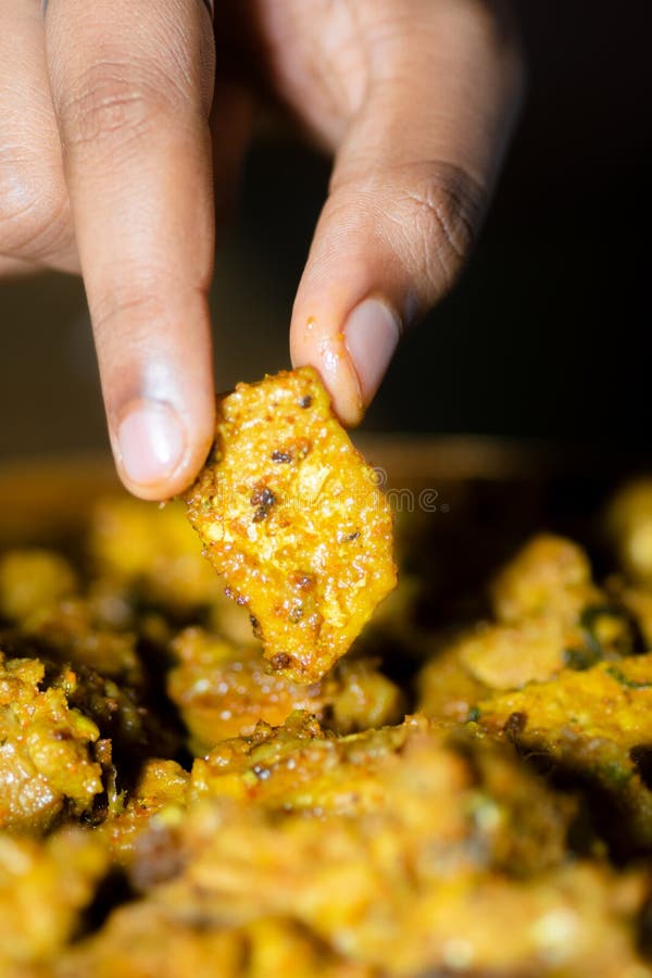 Fingers Picking Cooked and Spicy Chicken Piece. Stock Photo - Image of ...