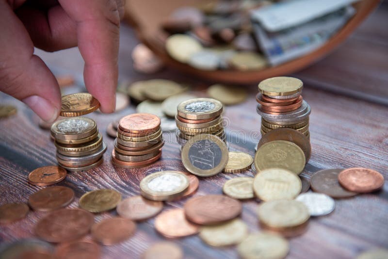Human Hand Placing Coin Money Stack After Breaking Box Concept Of Saving Money Financial Growth