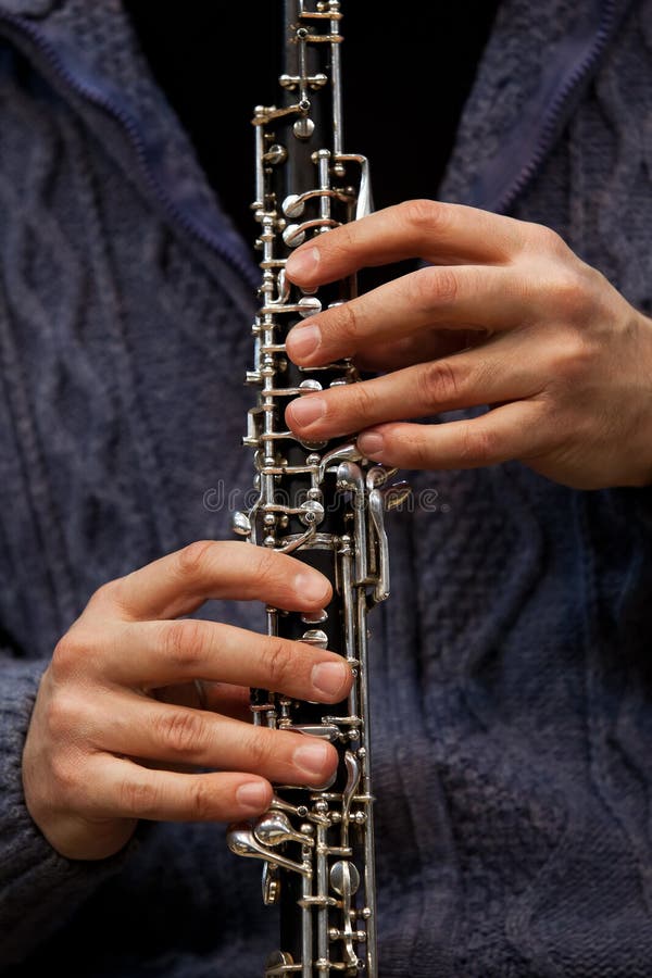 Oboe in the Hands of a Musician Closeup Stock Photo - Image of ensemble ...