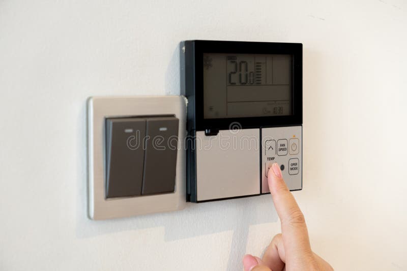 Human Hand Sets Thermostat Pressing Keys of Climate Control Panel on ...