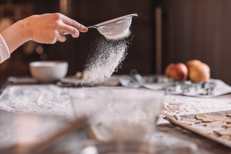 Human Hand Sifting Flour Above Kitchen Table Stock Photo - Image of ...