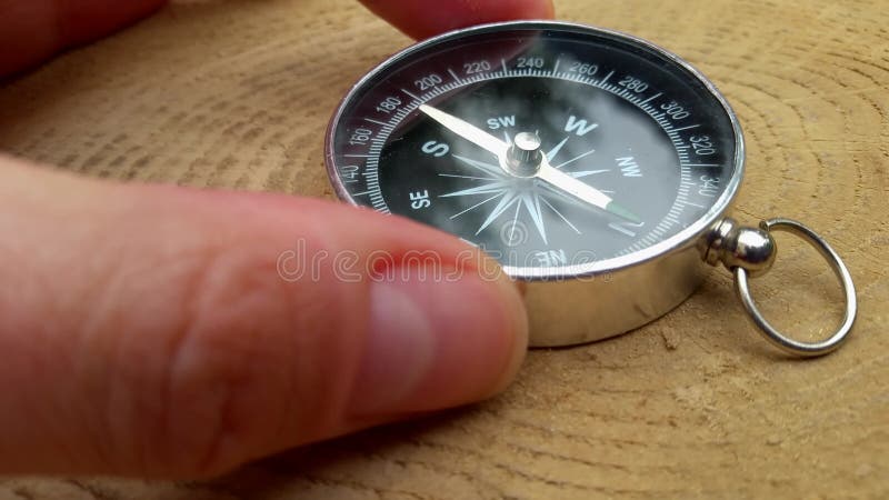 Human Hand and Takes the Compass Determines the Direction of the World ...