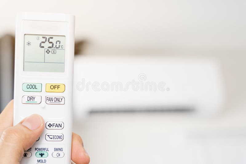 Human Hand is Using White Remote of Air Conditioner for Turn on or ...