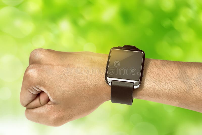 Human Hand Wearing Smart Watch Stock Photo - Image of blur, phone: 69073504