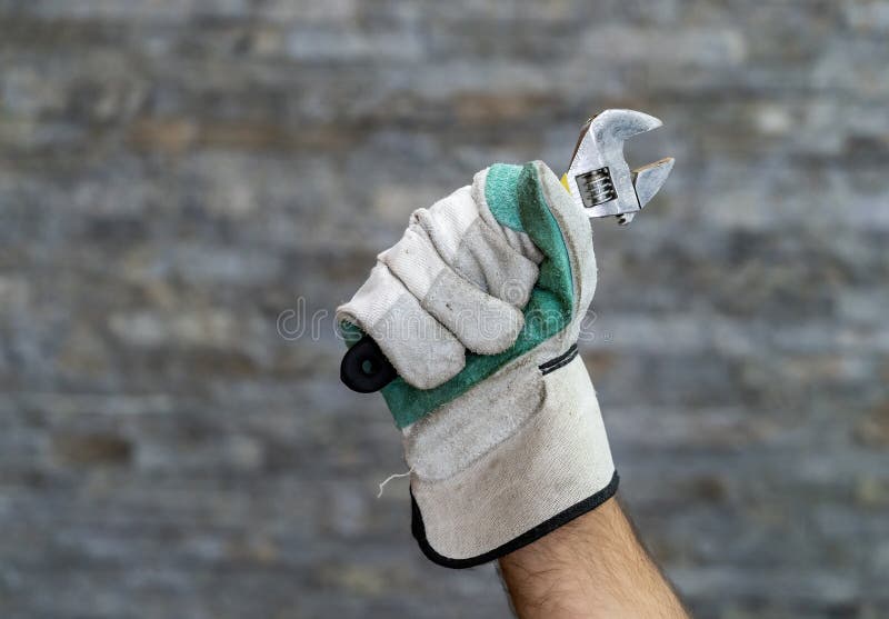 A Human Hand Wearing a Tough Work Glove Stock Image - Image of hand ...