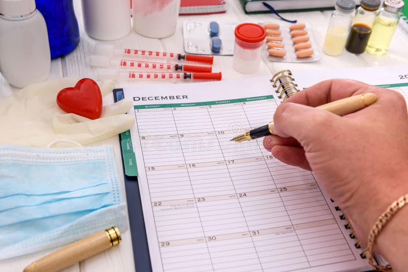 Human Hand Writing in Diary with Medical Supplies Stock Image - Image ...