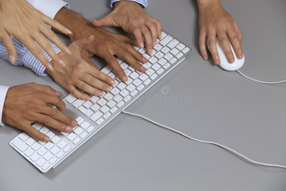 Human Hands on Computer Keyboard with One Hand Using Computer Mouse ...