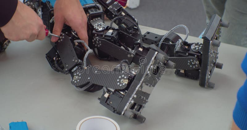 Human Hands are Engaged in Mechanical Assembly of the Robot Using a ...