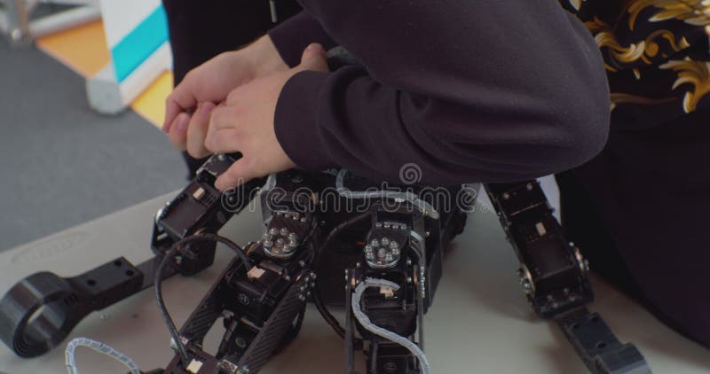 Human Hands are Engaged in Mechanical Assembly of the Robot Using a ...