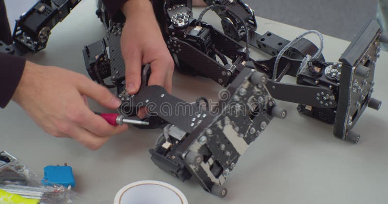 Human Hands are Engaged in Mechanical Assembly of the Robot Using a ...