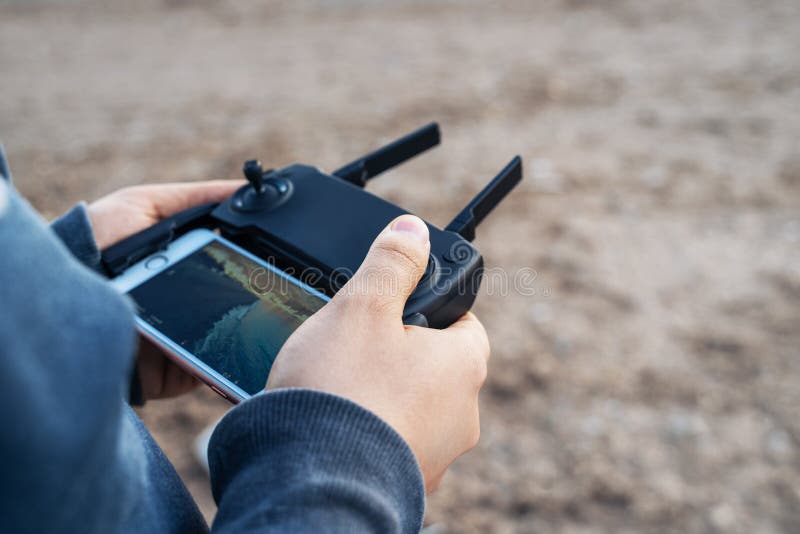 Human Hands Holding Appliance for Flying Drone and Mobile Phone with ...