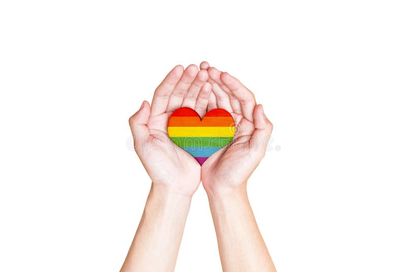 Human Hands Holding Heart With Rainbow Flag As A Symbol Of Lgbt Stock