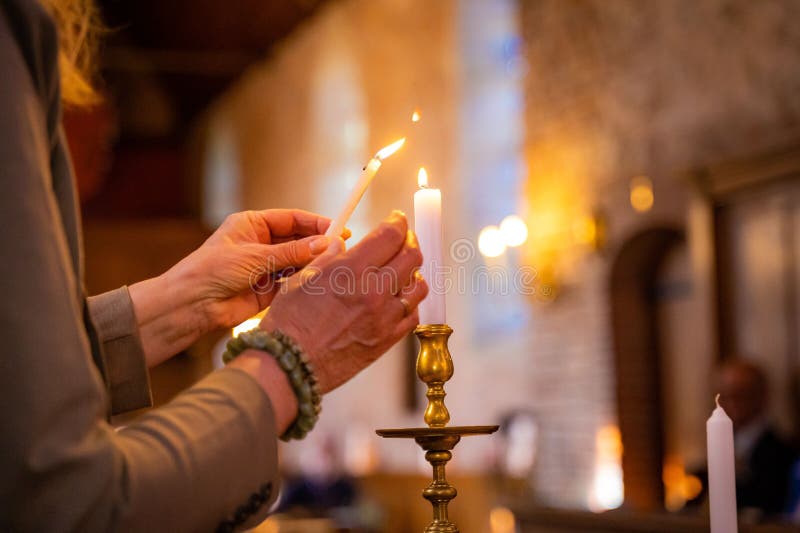 Human Hands Lighting a Holy Candle in a Church Stock Image - Image of ...