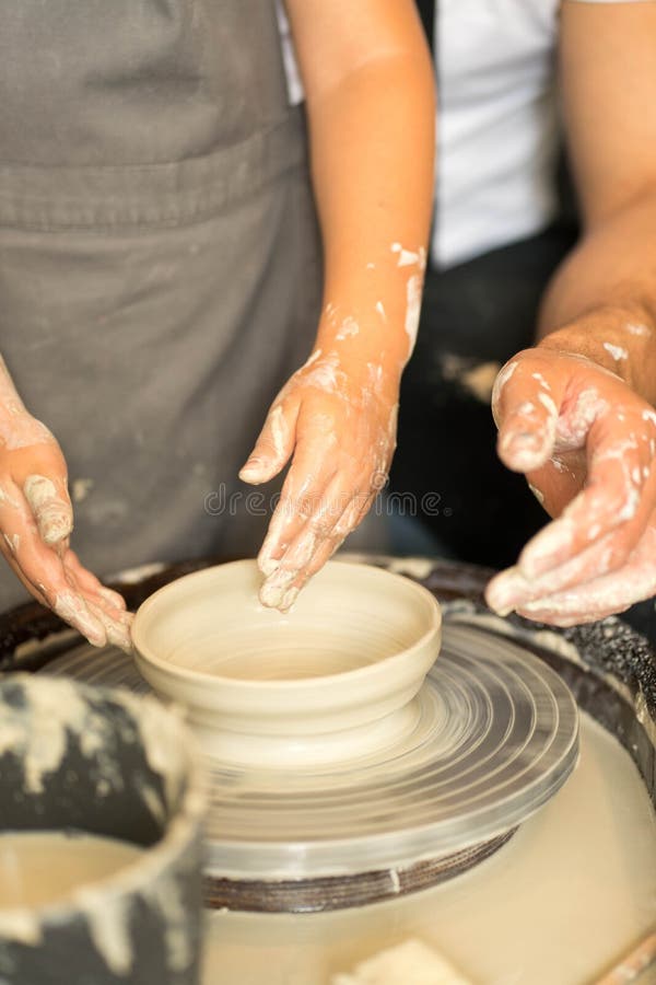 Human Hands Make a Clay Product on a Potter& X27;s Wheel Stock Image ...
