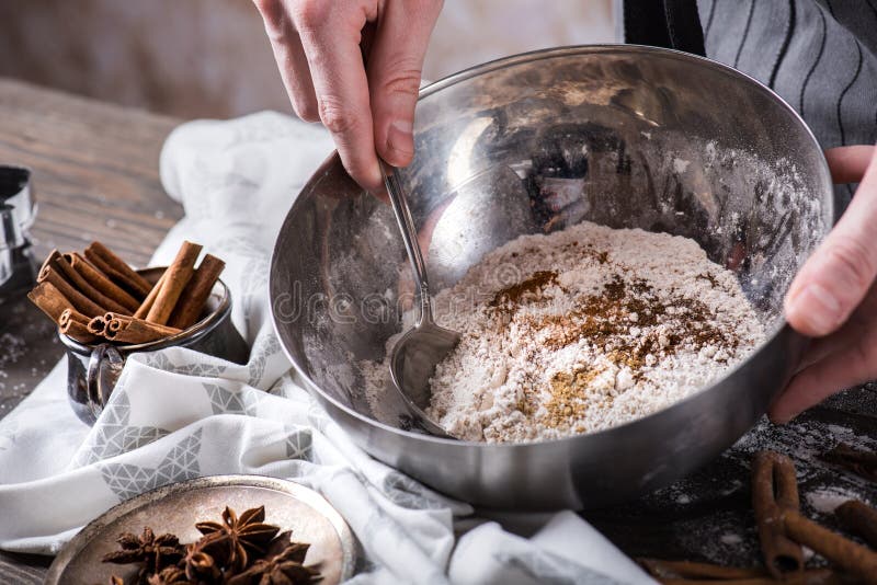 Human Hands Mixing Ingredients for Making Cookies with Spoon Stock ...