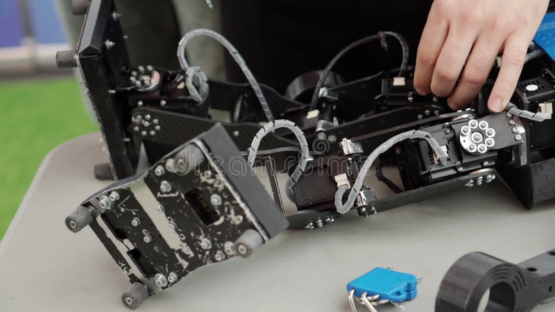 Repairing a Broken Robot with a Screwdriver. Stock Footage - Video of ...
