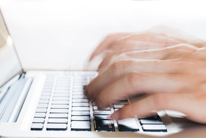 Human Hands Typing on Laptop in Blurred Motion with Copy Space a Stock ...