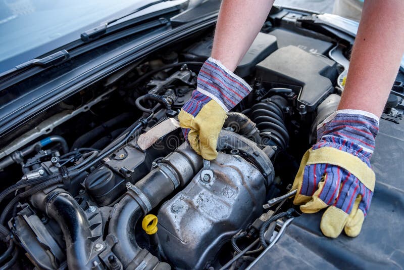 Human Hands with Wrenches in Protective Gloves upon Car Engine Stock ...