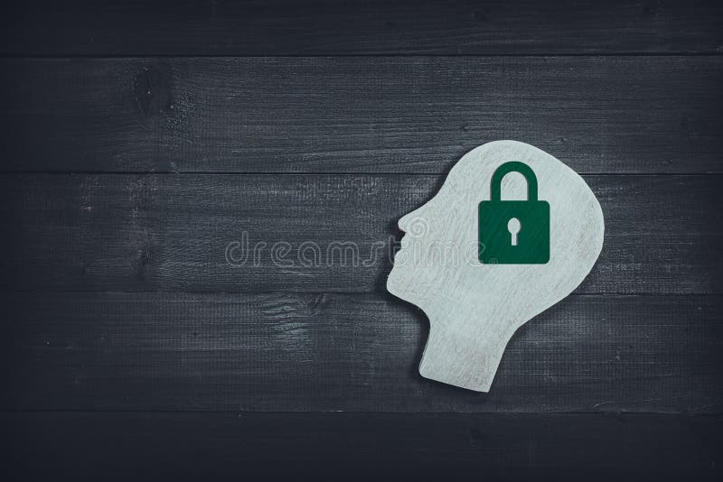 Human Head and Face with Green Lock on Wood Table Background. Brain of ...